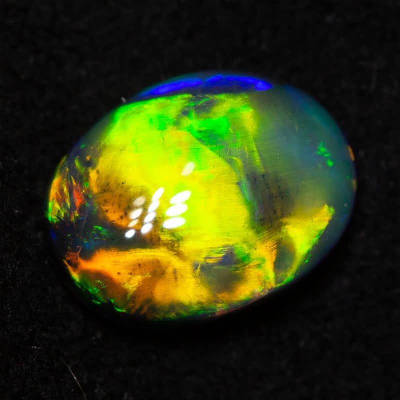 0.58 ct gem black opal 7.1x5.4x2.3mm