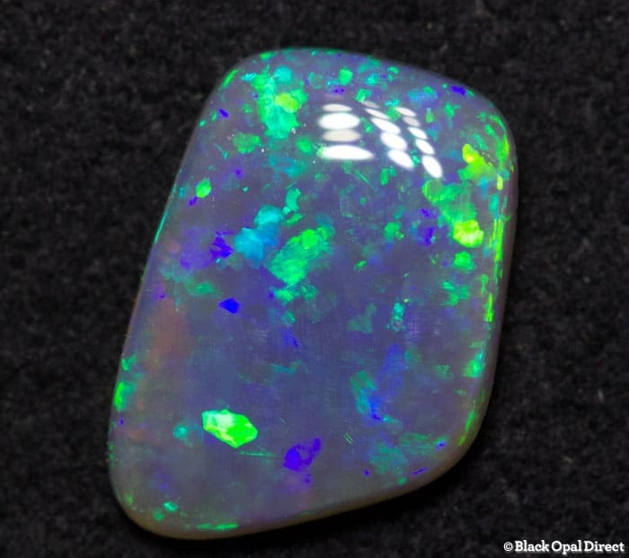 0.87 ct semi black opal 9x6x2mm