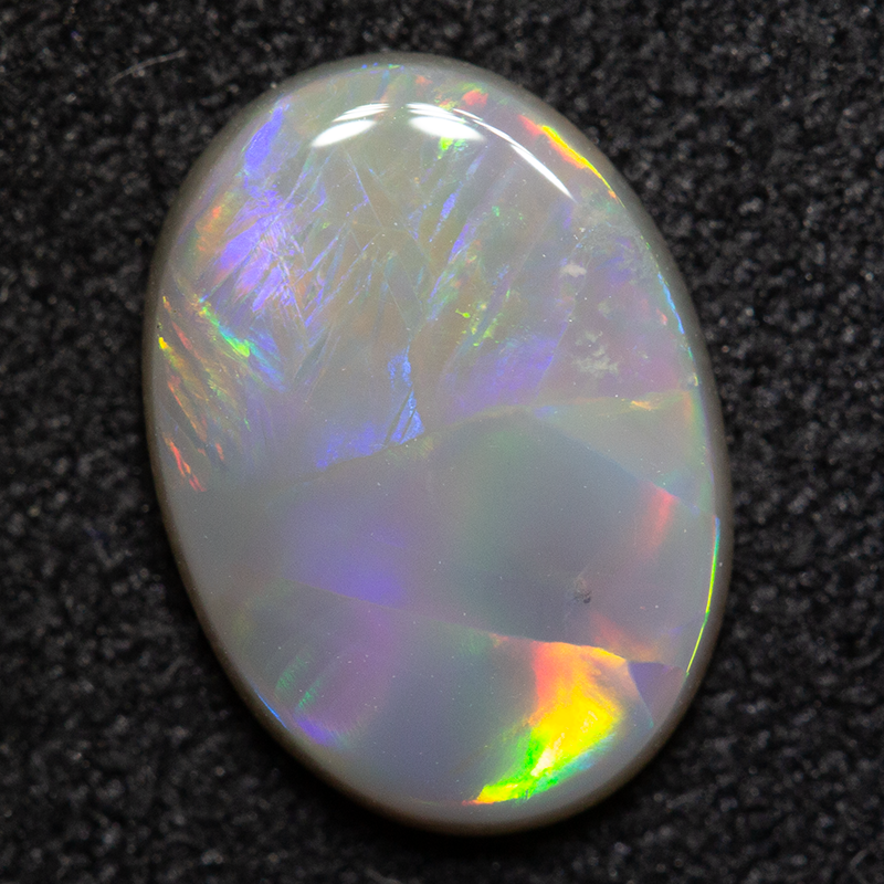 1.26 ct dark opal 10.3x7.4x2.2mm