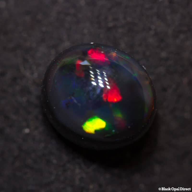 1.29 ct black opal 7x6x4.8mm