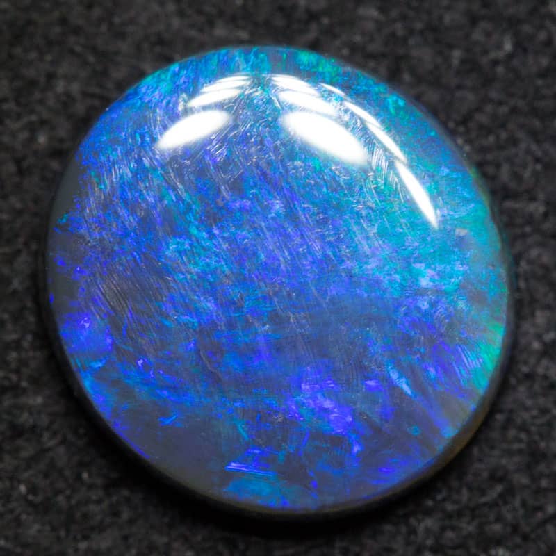 1.58 ct black opal 9x8.4x2.8mm