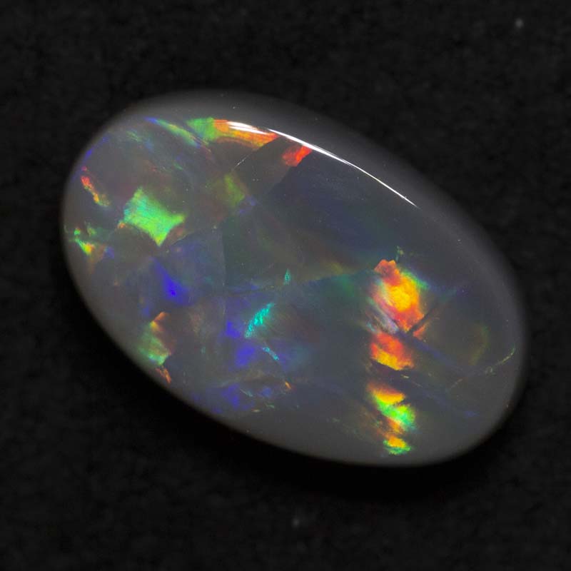 1.61 ct dark opal 10.3x6.5x3.6mm