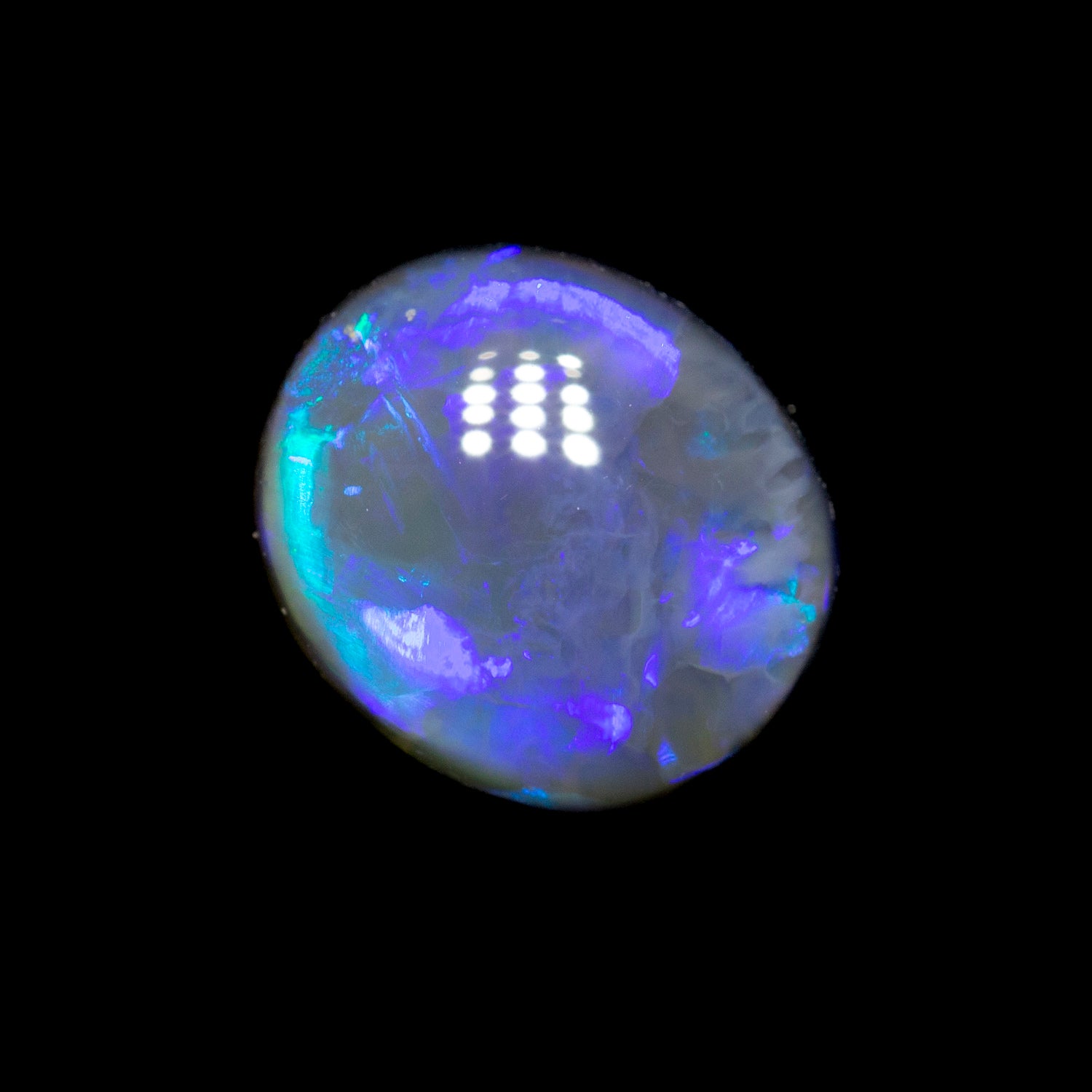 1.73 ct black opal 8x6.8x4.6mm