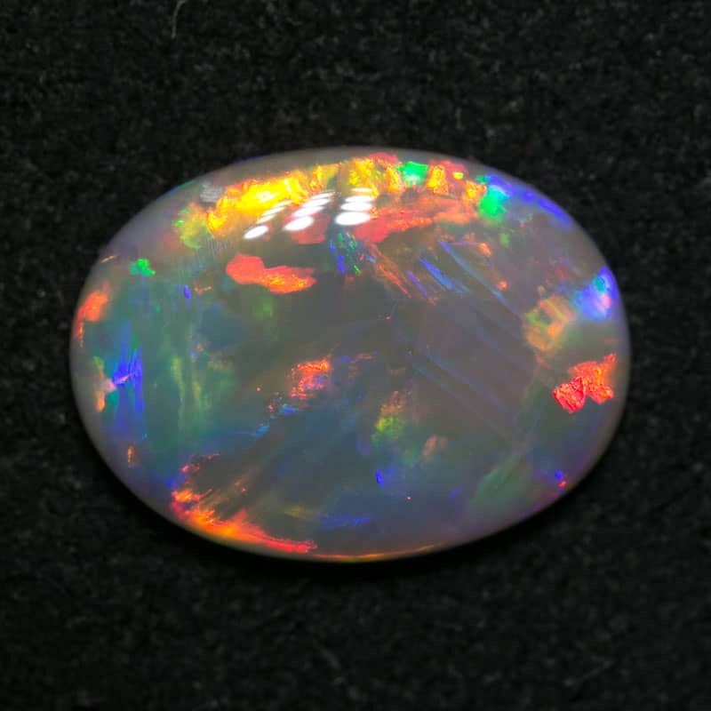 1.79 ct dark opal 11.5x8.5x2.5mm