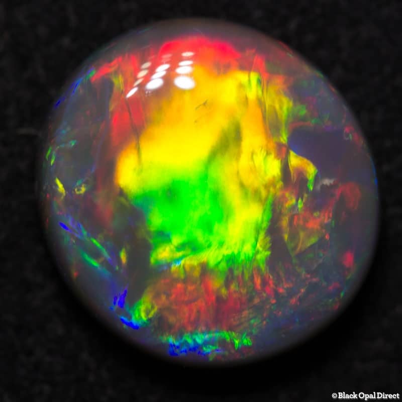 2.51 ct semi black gem opal 10x9x4mm Abi