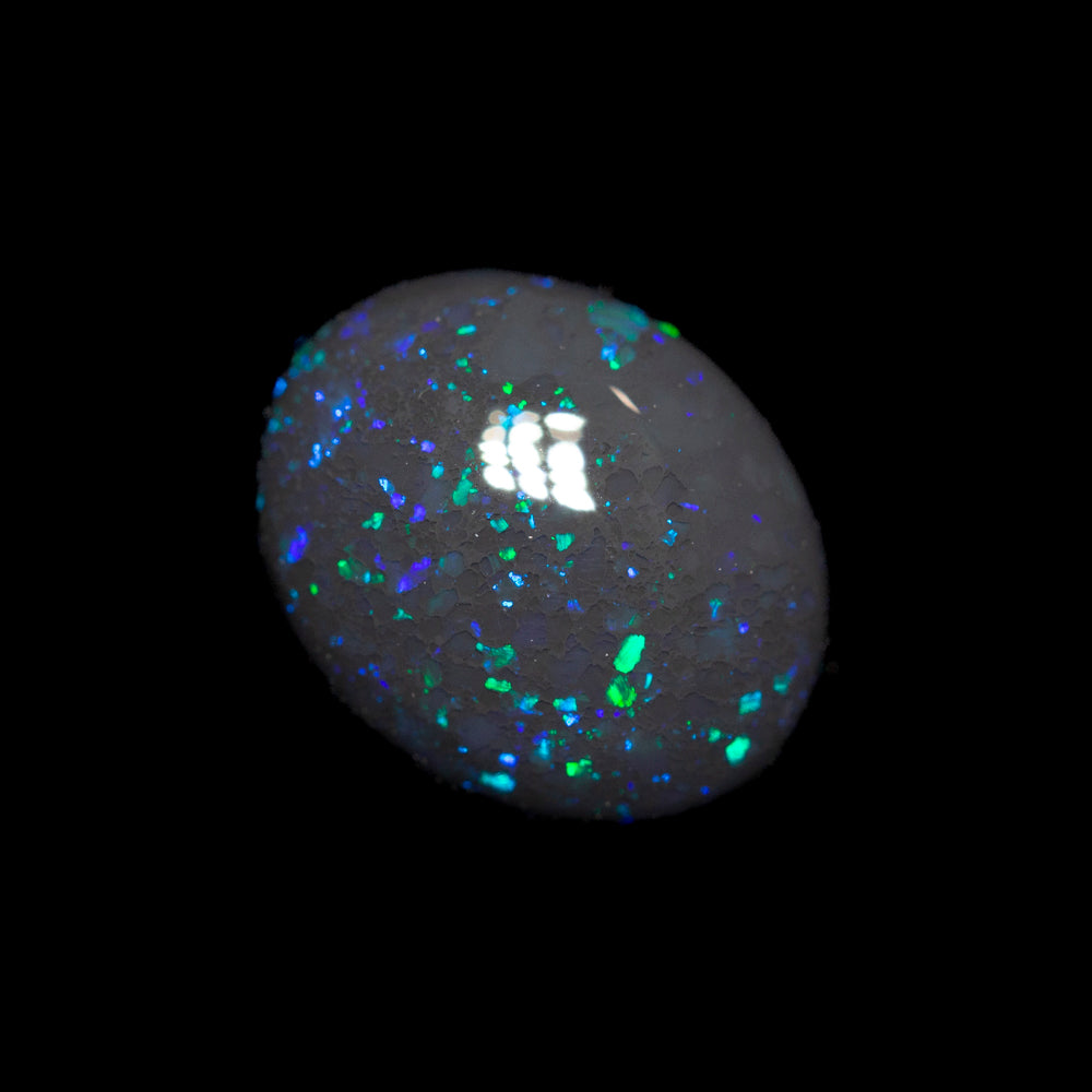 2.71 ct black opal 9.7x7.9x5.5mm