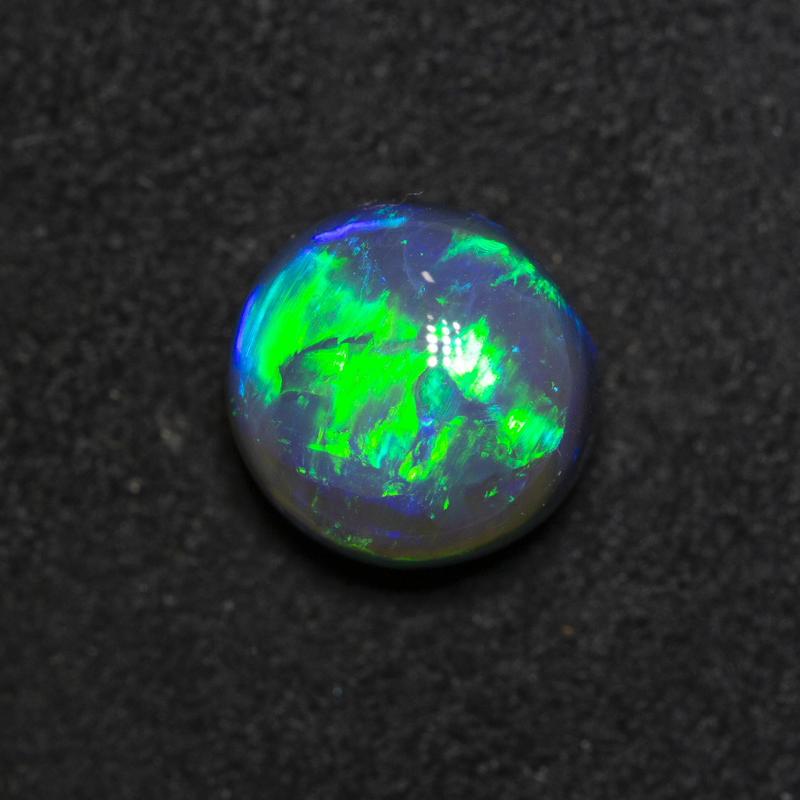 2.92 ct black opal gem 8.7x8.4x6.5mm
