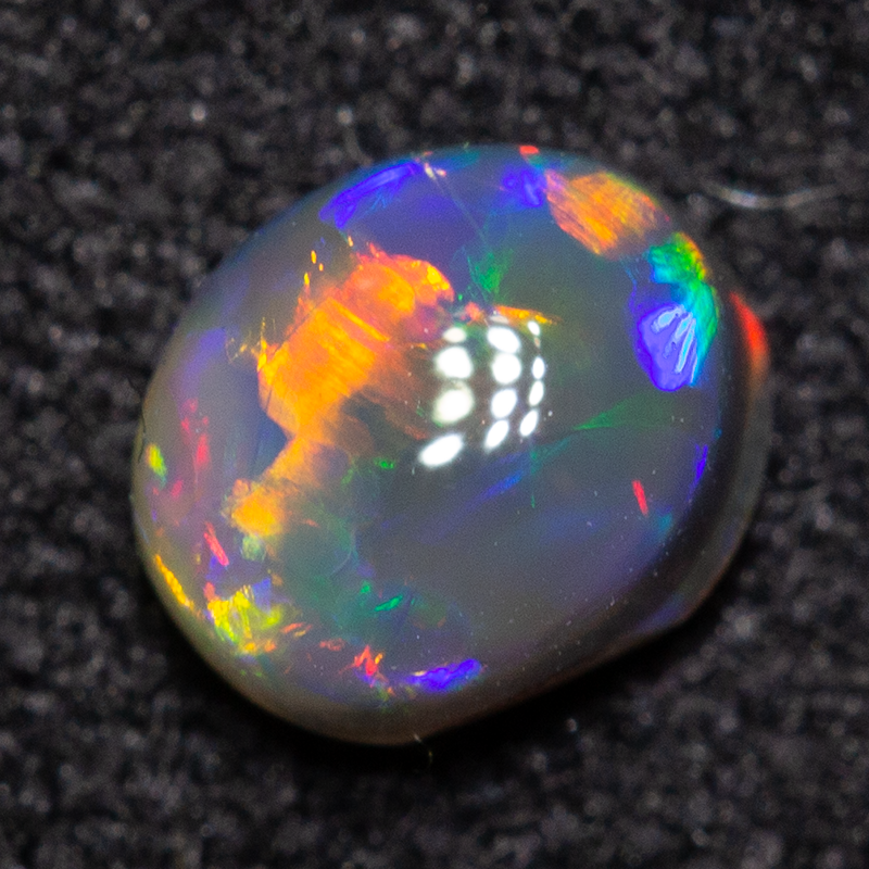 0.35 ct black opal 4.8x4.3x2.8mm