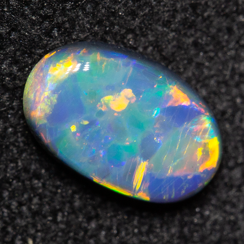 0.52 ct black opal 7x4.5x2.3mm
