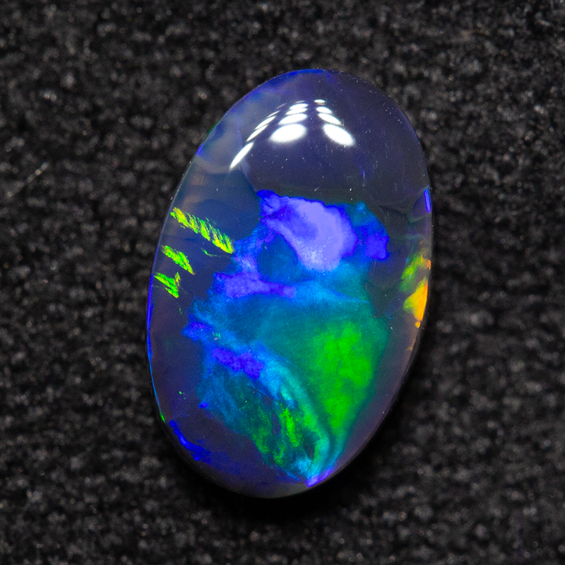 0.60 ct black opal 7.1x4.6x2.5mm