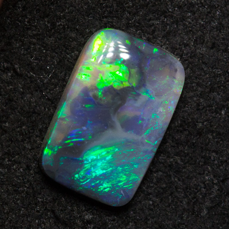 0.64 ct black opal 7.4x4.8x2mm