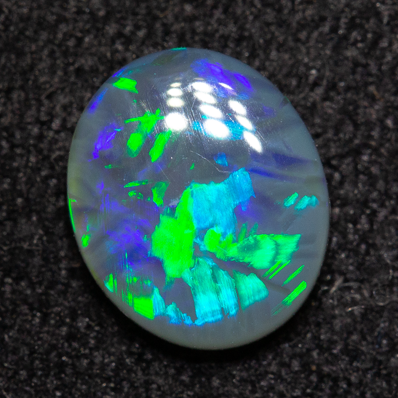 0.66 ct dark opal 7.1x6x2.3mm