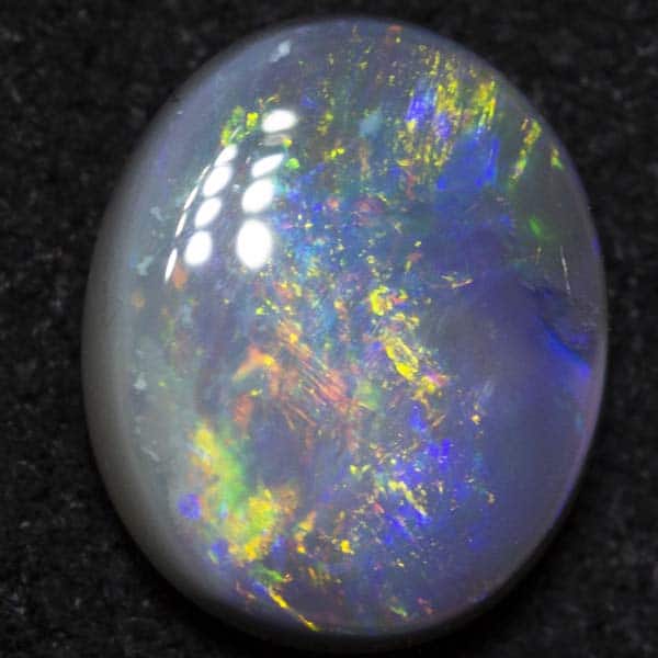 0.66 ct black opal 6.9x7x2.4mm