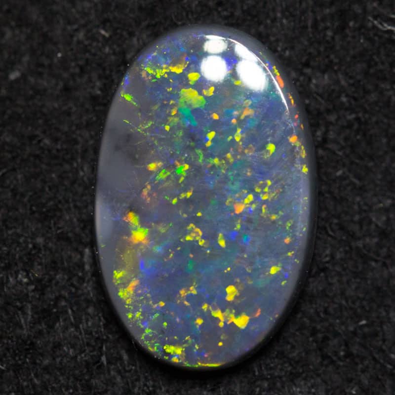 0.69 ct black opal 8.9x5.8x1.9mm