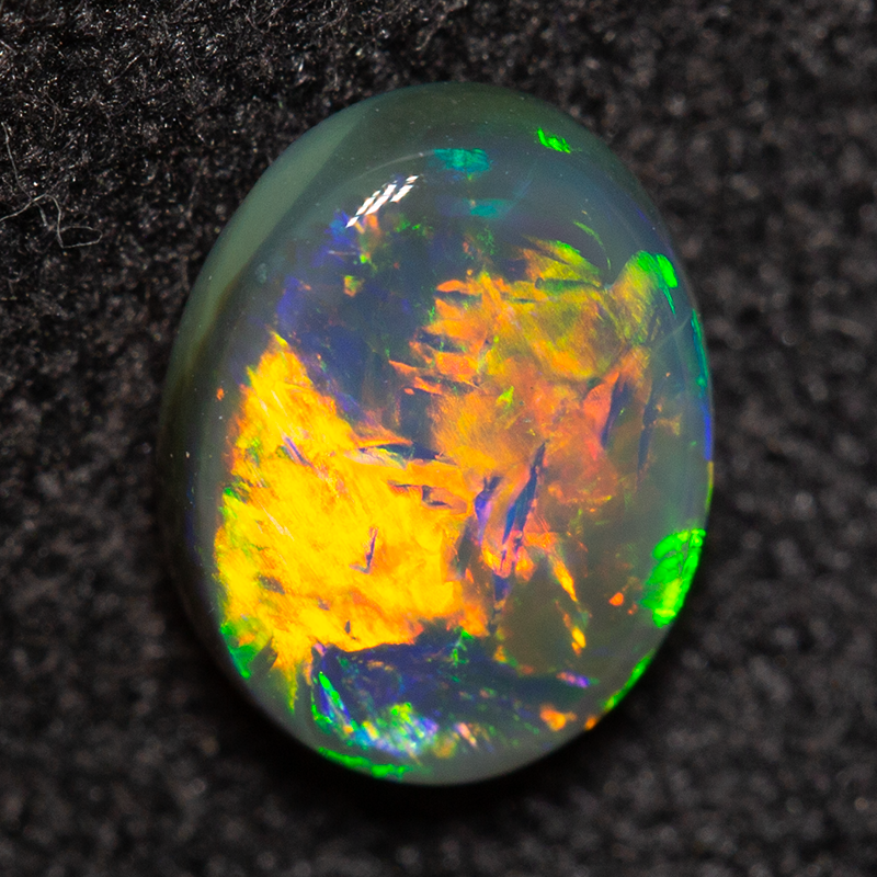 0.70 ct black opal 6.9x5.4x2.7mm
