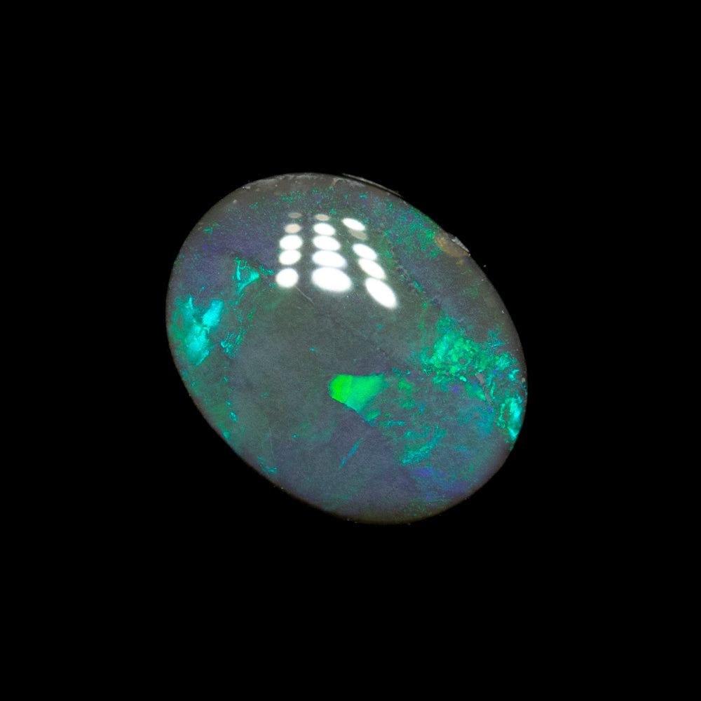 0.82 ct black opal 7.1x5.7x2.8mm