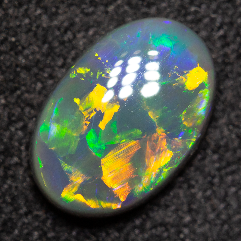 0.87 ct black opal 8.1x5.7x2.7mm