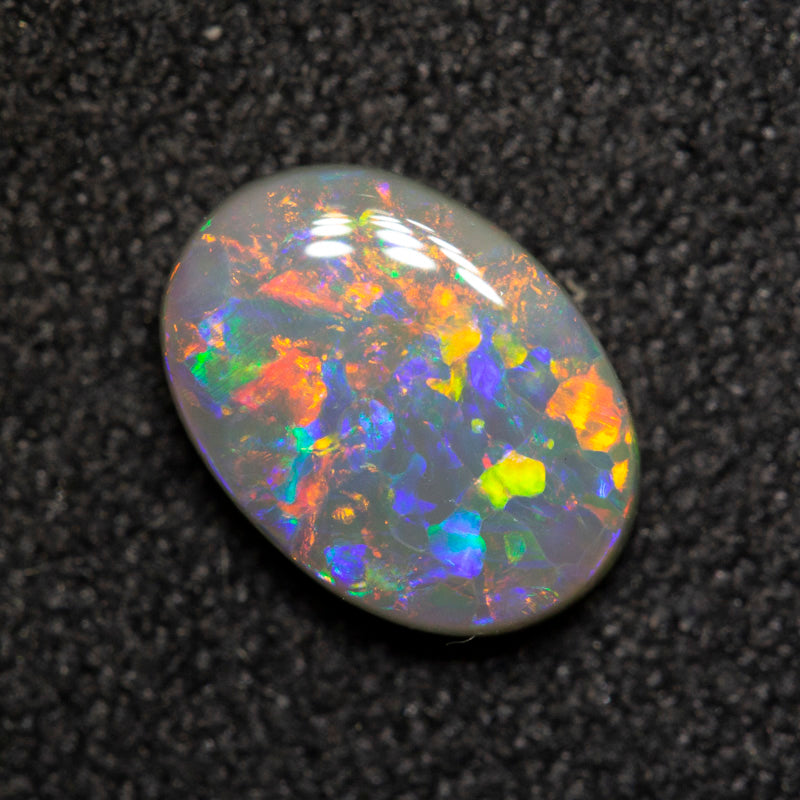 0.91 ct dark opal 8.1x5.9x2.6mm