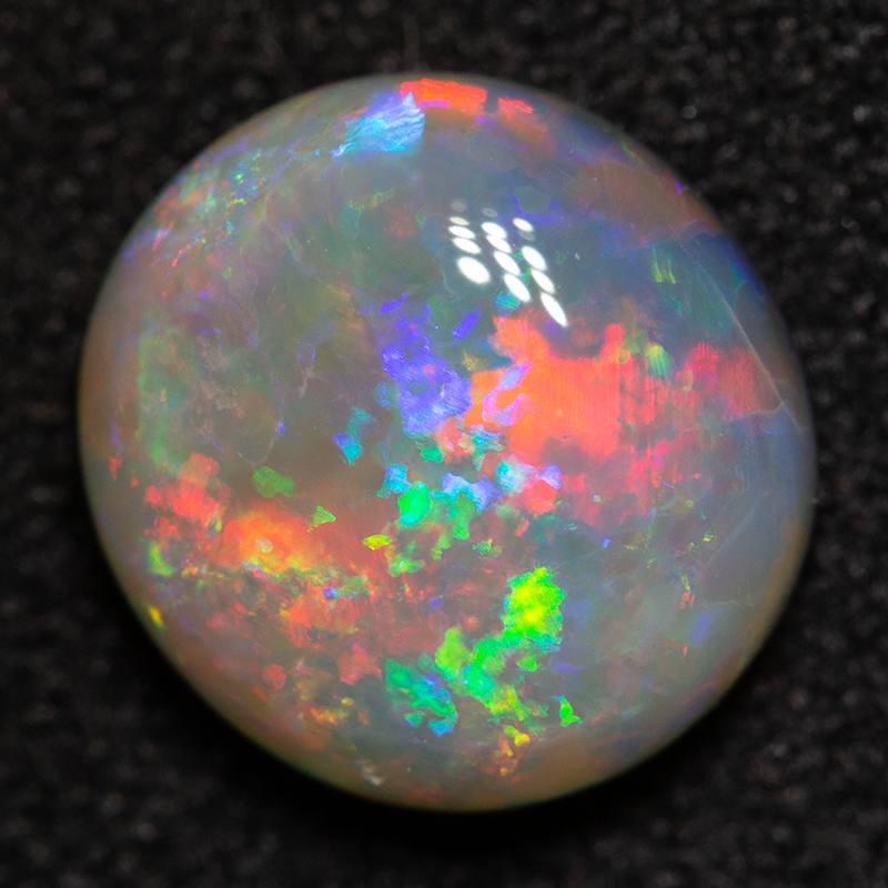 1.88 ct dark opal 8.9x8.5x3.8mm