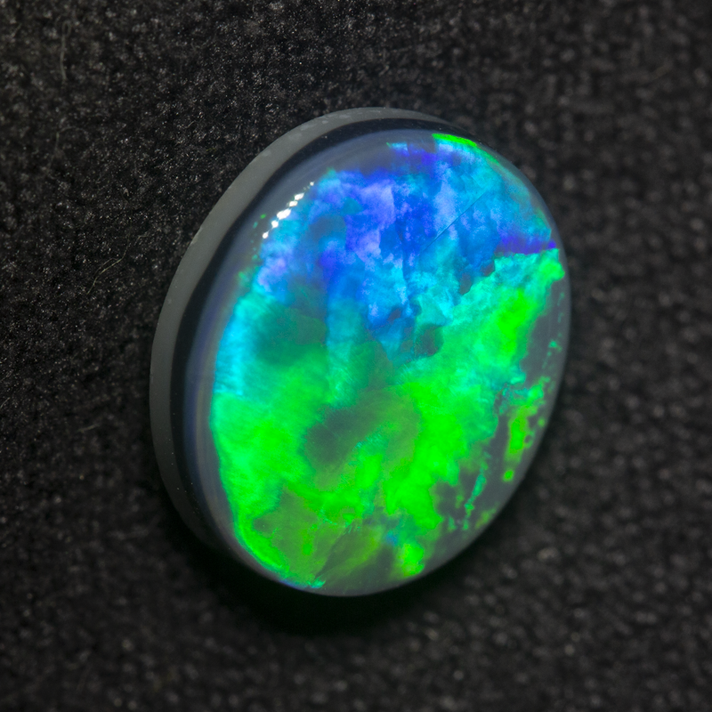 2.65 ct black opal 10.4x8.9x4.4mm