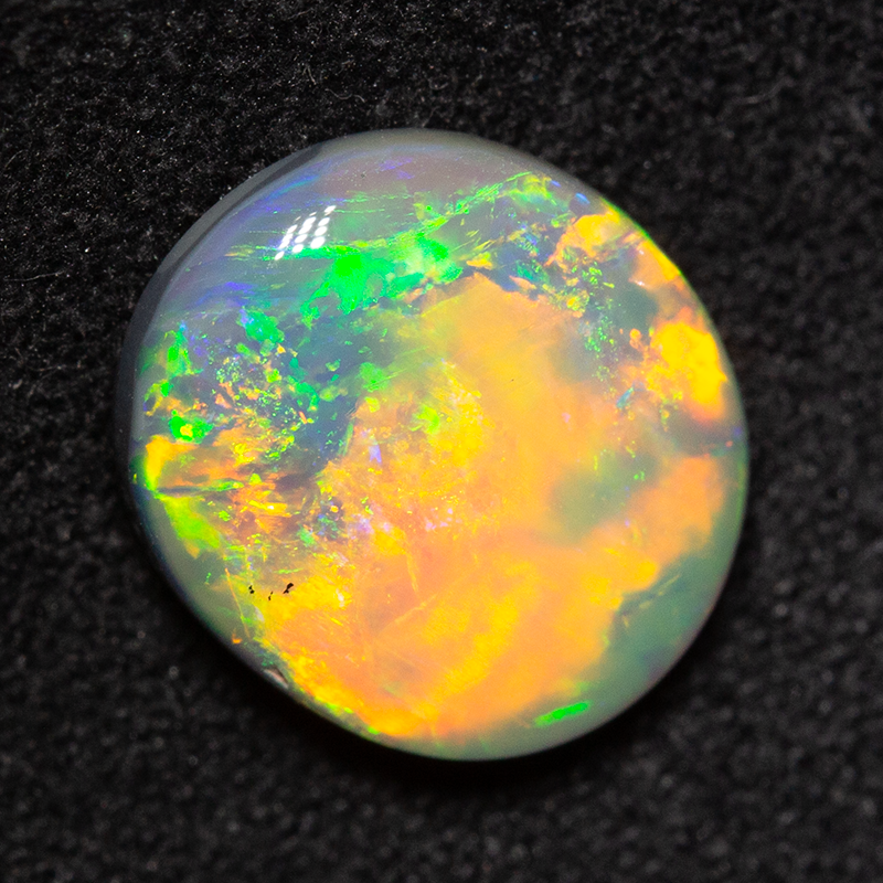 2.88 ct dark opal 11x10x3.5mm