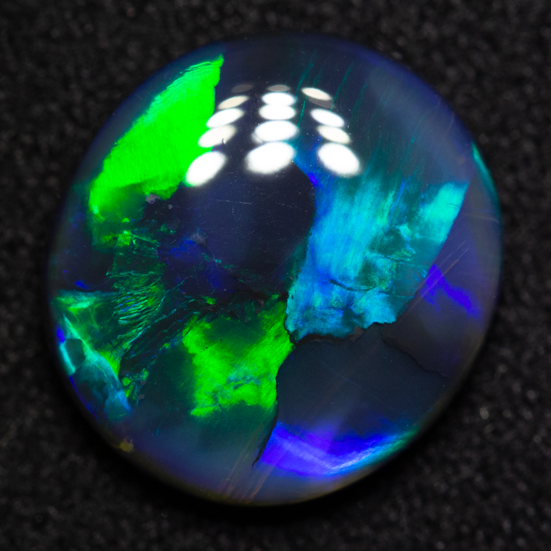 3.07 ct black opal 12x11x4mm