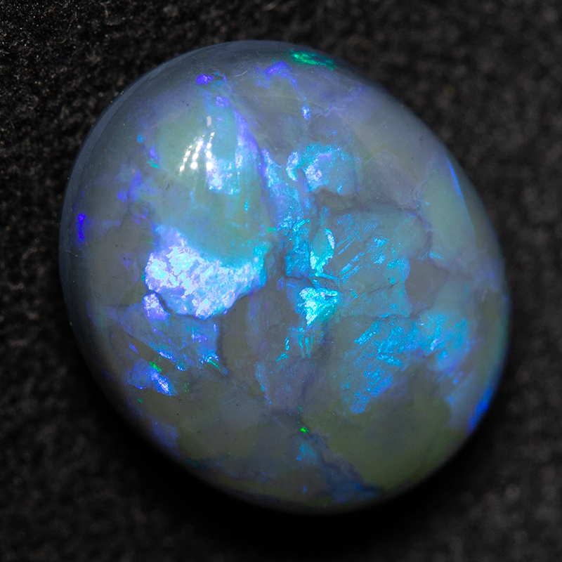 3.78 ct dark opal 11x9x5.9mm