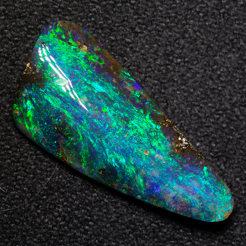 3.88 ct boulder opal 19x8.5x3.4mm