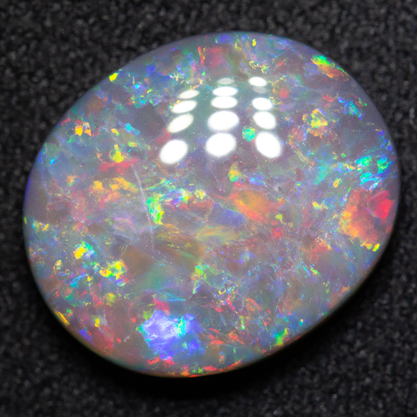 4.61 ct dark opal 13.7x11.6x4.3mm