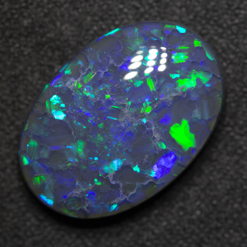 6.88 ct gem black opal 16.4x11.4x5.7mm